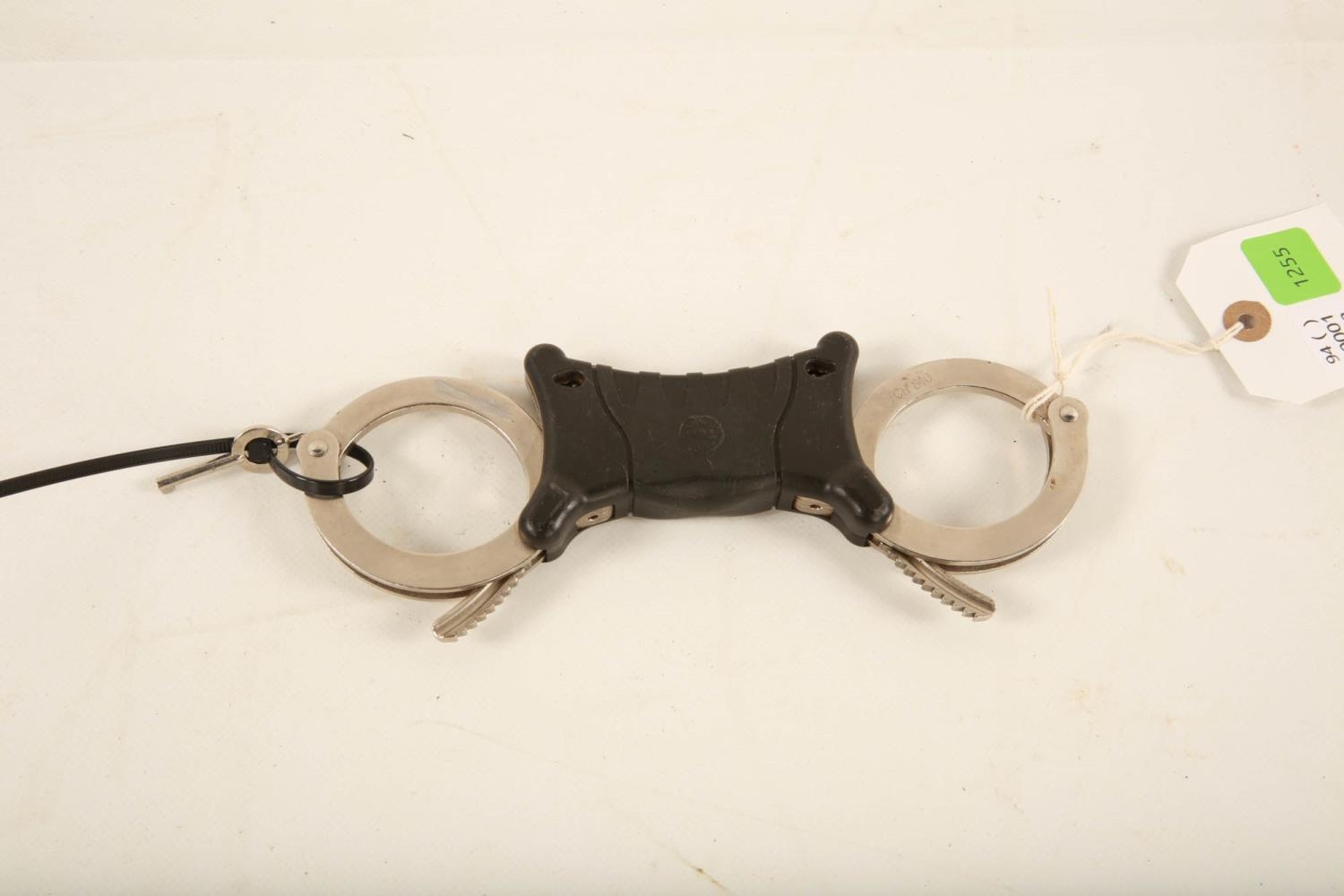 Stainless Steel and Black Plastic Hiatt Rigid Handcuffs - On The Square ...