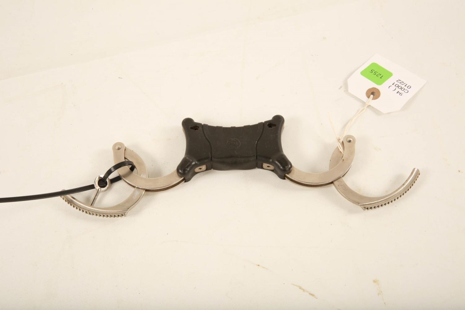 Stainless Steel and Black Plastic Hiatt Rigid Handcuffs - On The Square ...