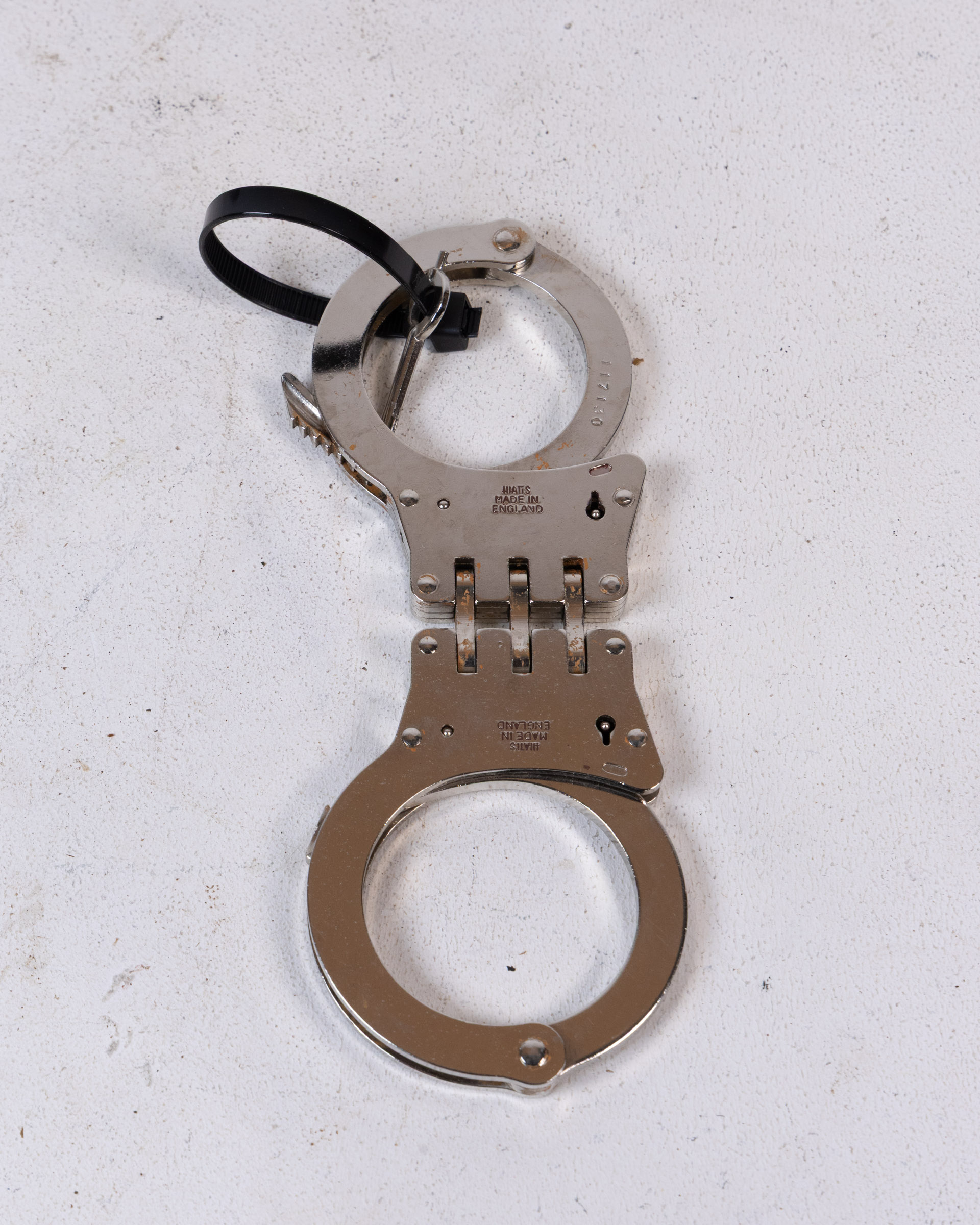 Pair of Police Watts Handcuffs Complete with Key - On The Square Emporium